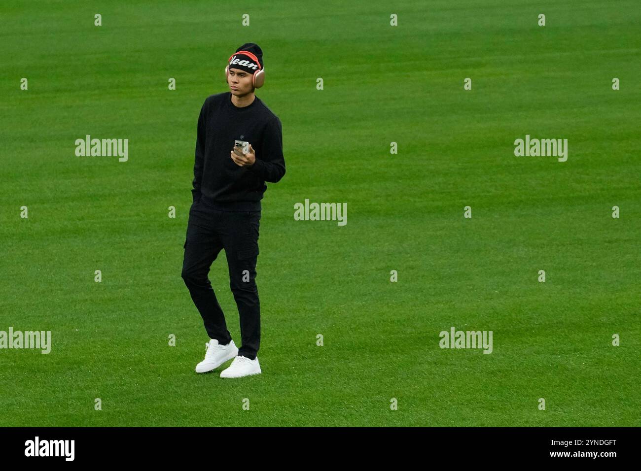 Leipzig's Antonio Nusa stands during a pitch inspection ahead of ...