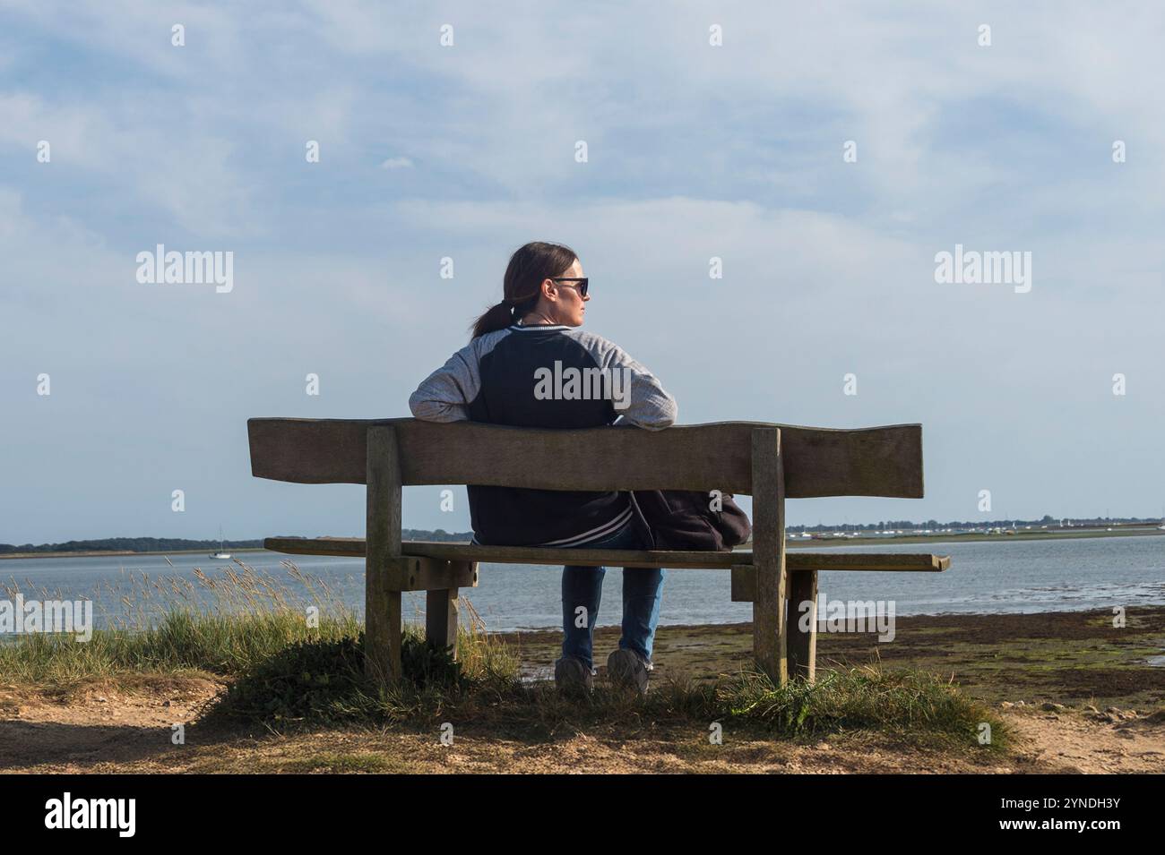 Woman backview bench sea hi-res stock photography and images - Alamy