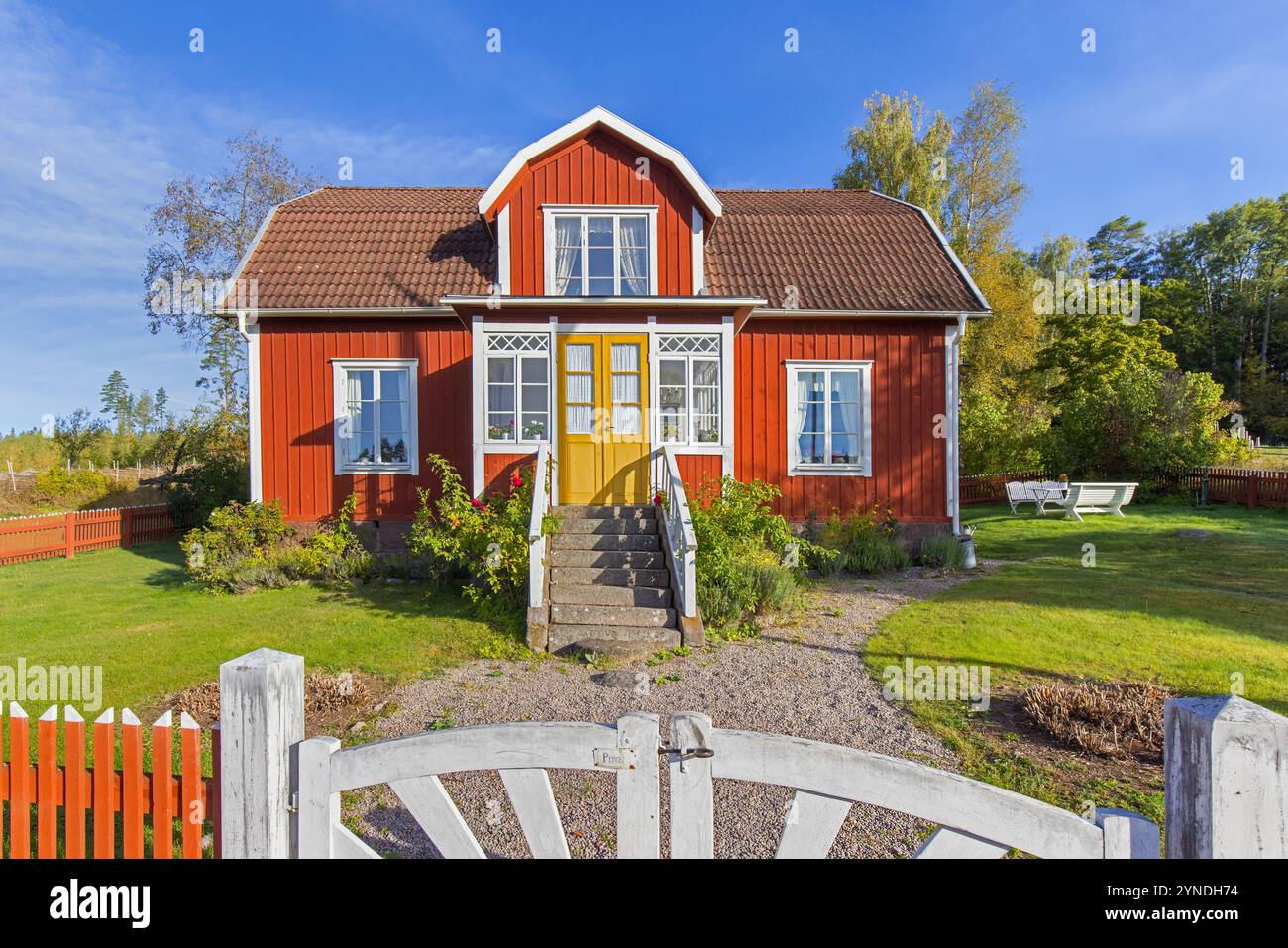 Katthult, red wooden farm house with fence from Astrid Lindgren's tales ...