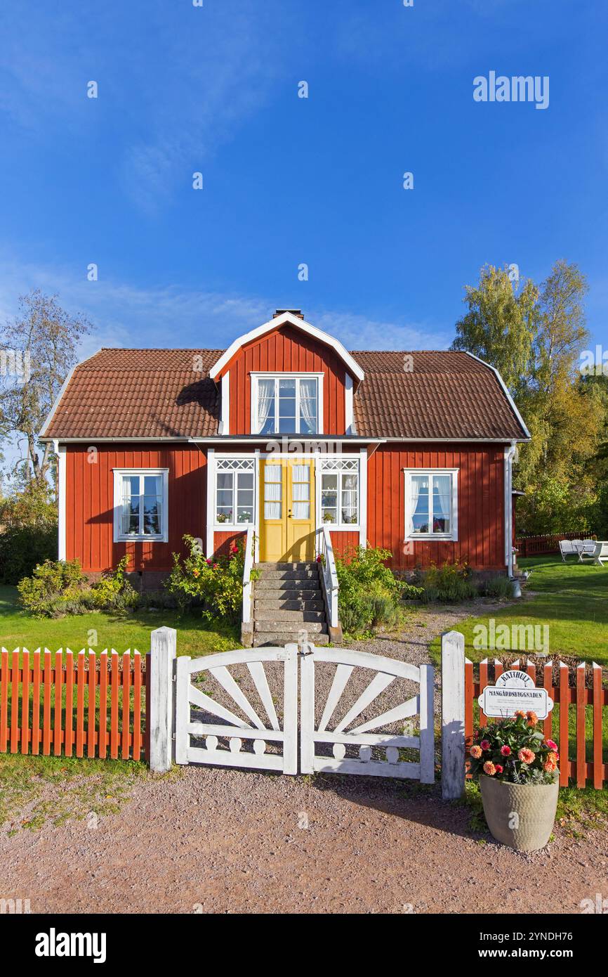 Katthult, red wooden farm house with fence from Astrid Lindgren's tales ...