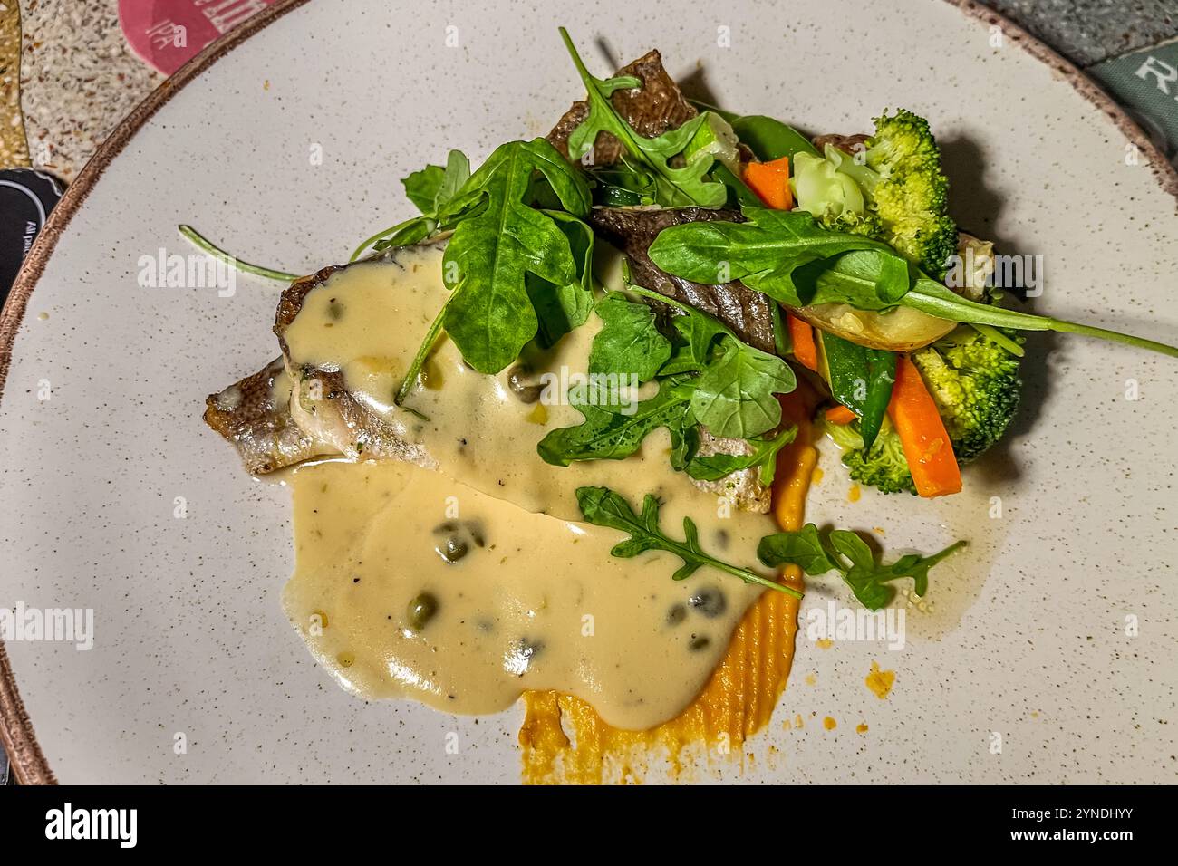 Mahi mahi fish fillet with caper sauce and vegetables. Gouverneur de ...