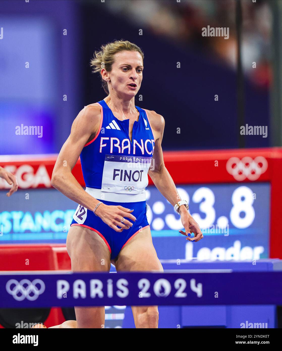 Alice Finot participating in the 3000 metres steeplechase at the Paris ...