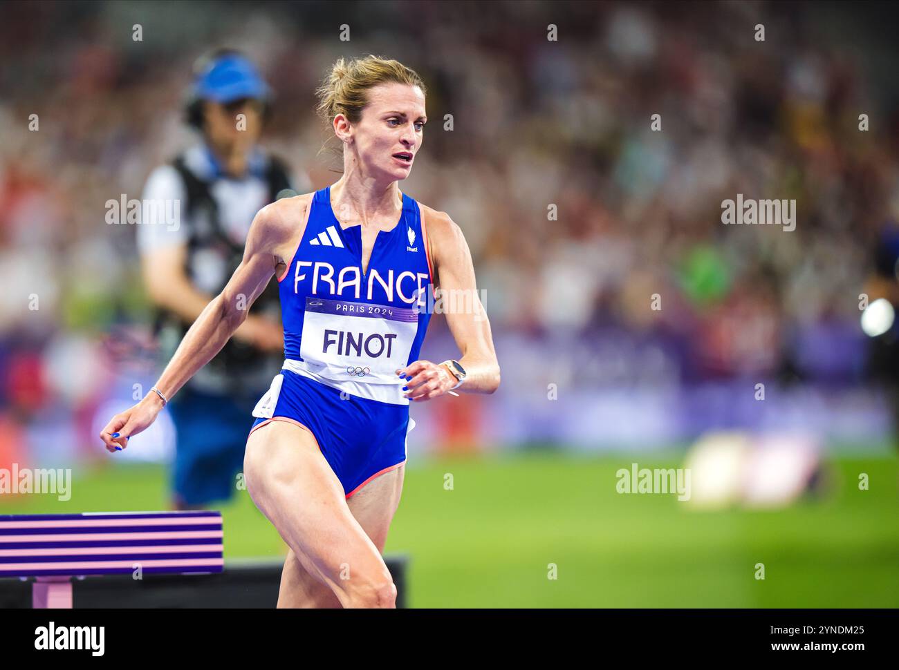 Alice Finot participating in the 3000 metres steeplechase at the Paris ...