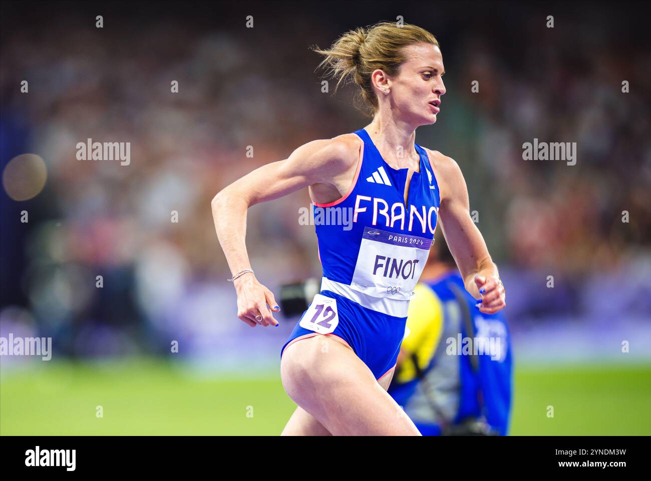 Alice Finot participating in the 3000 metres steeplechase at the Paris ...