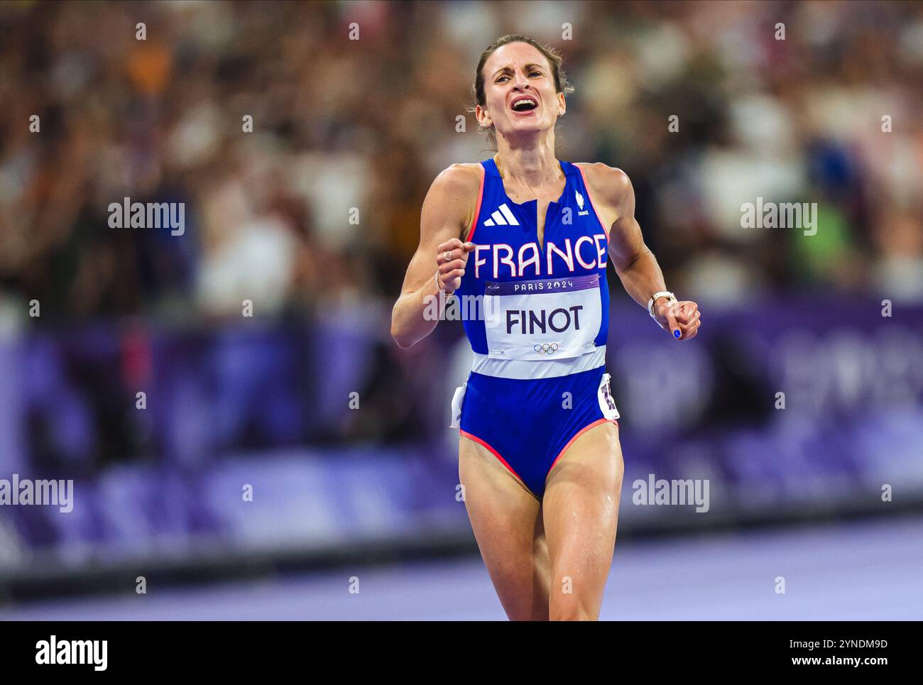 Alice Finot participating in the 3000 metres steeplechase at the Paris ...