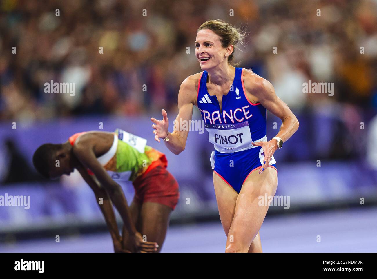 Alice Finot participating in the 3000 metres steeplechase at the Paris ...
