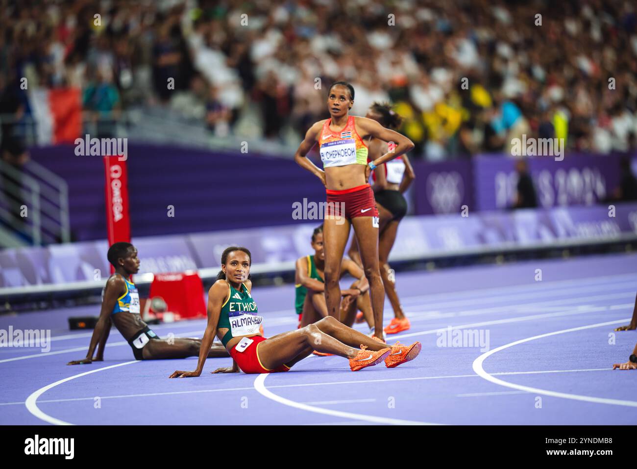 Sembo Almayew participating in the 3000 metres steeplechase at the ...