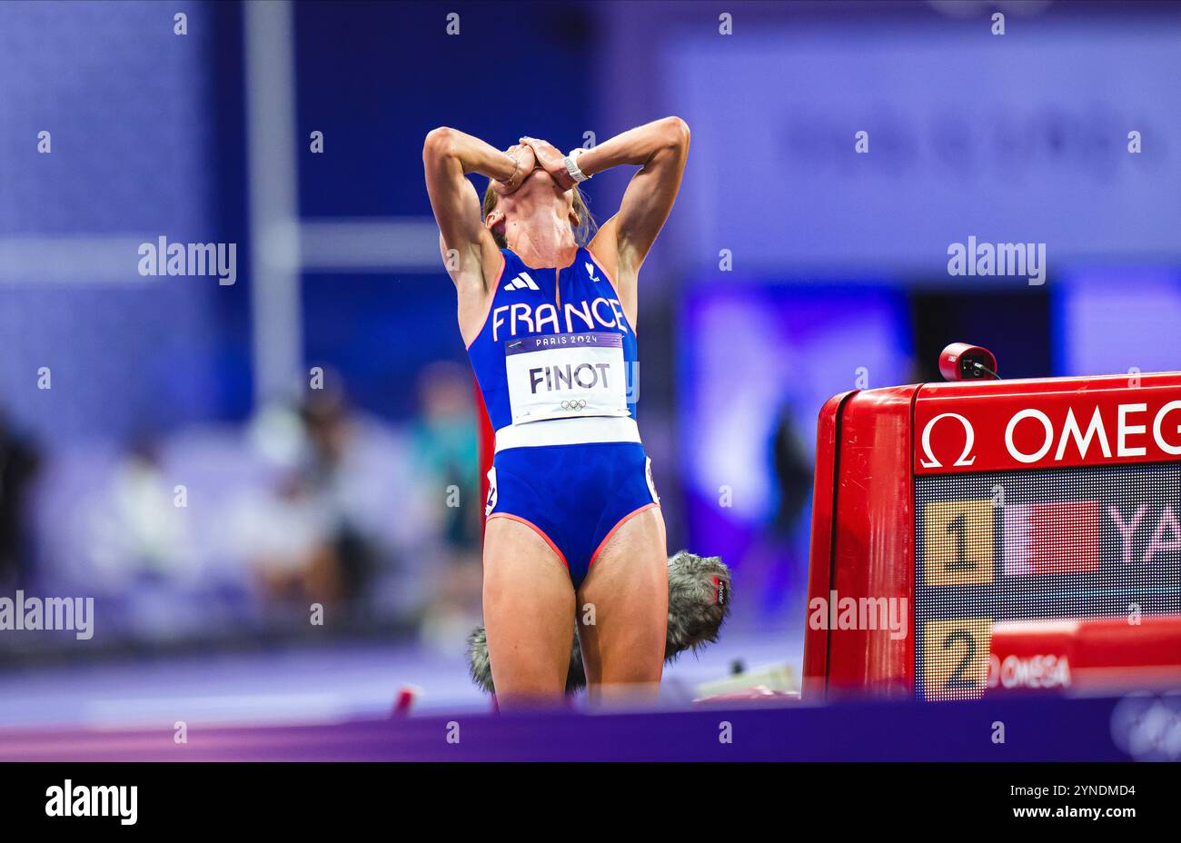 Alice Finot participating in the 3000 metres steeplechase at the Paris ...
