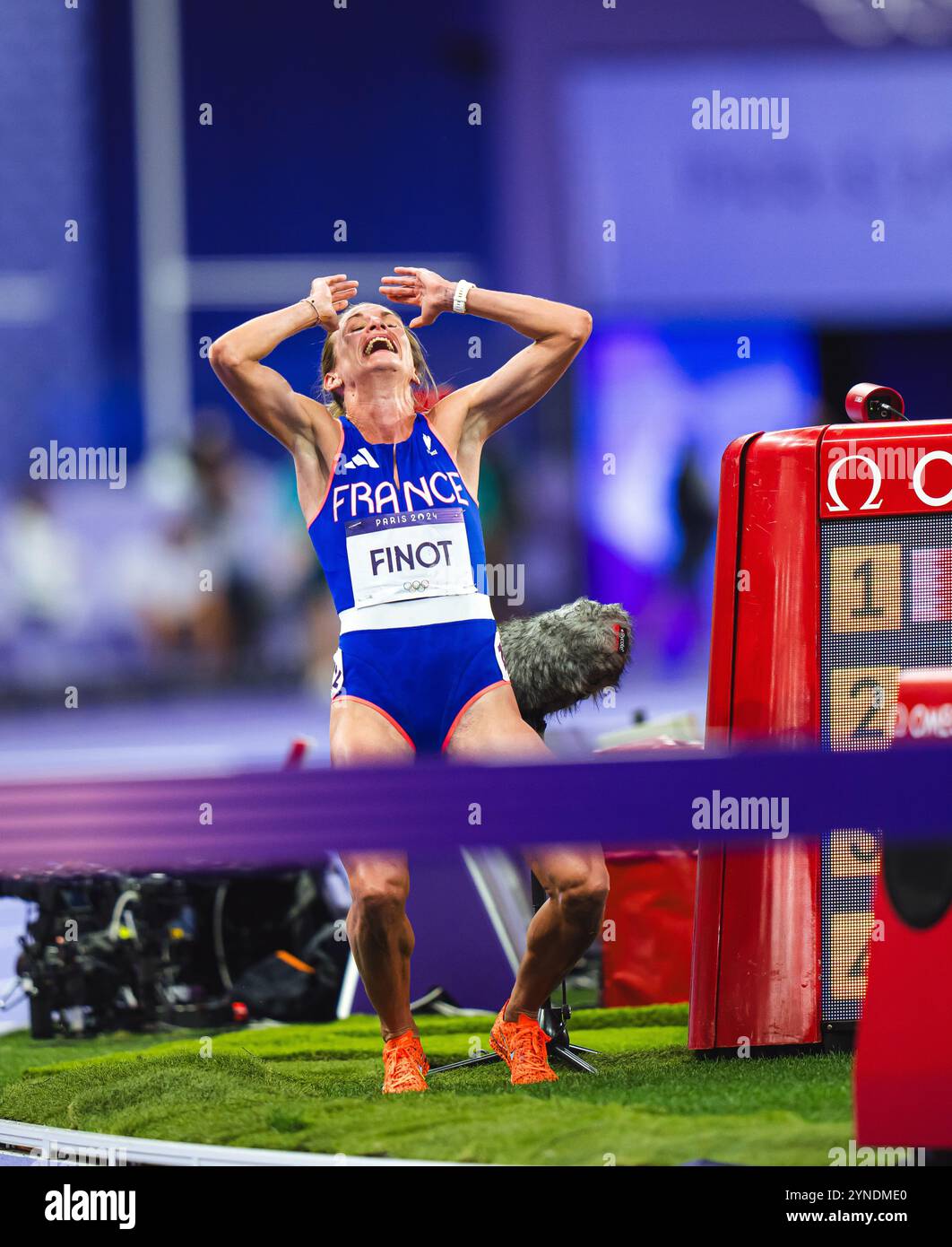 Alice Finot participating in the 3000 metres steeplechase at the Paris ...