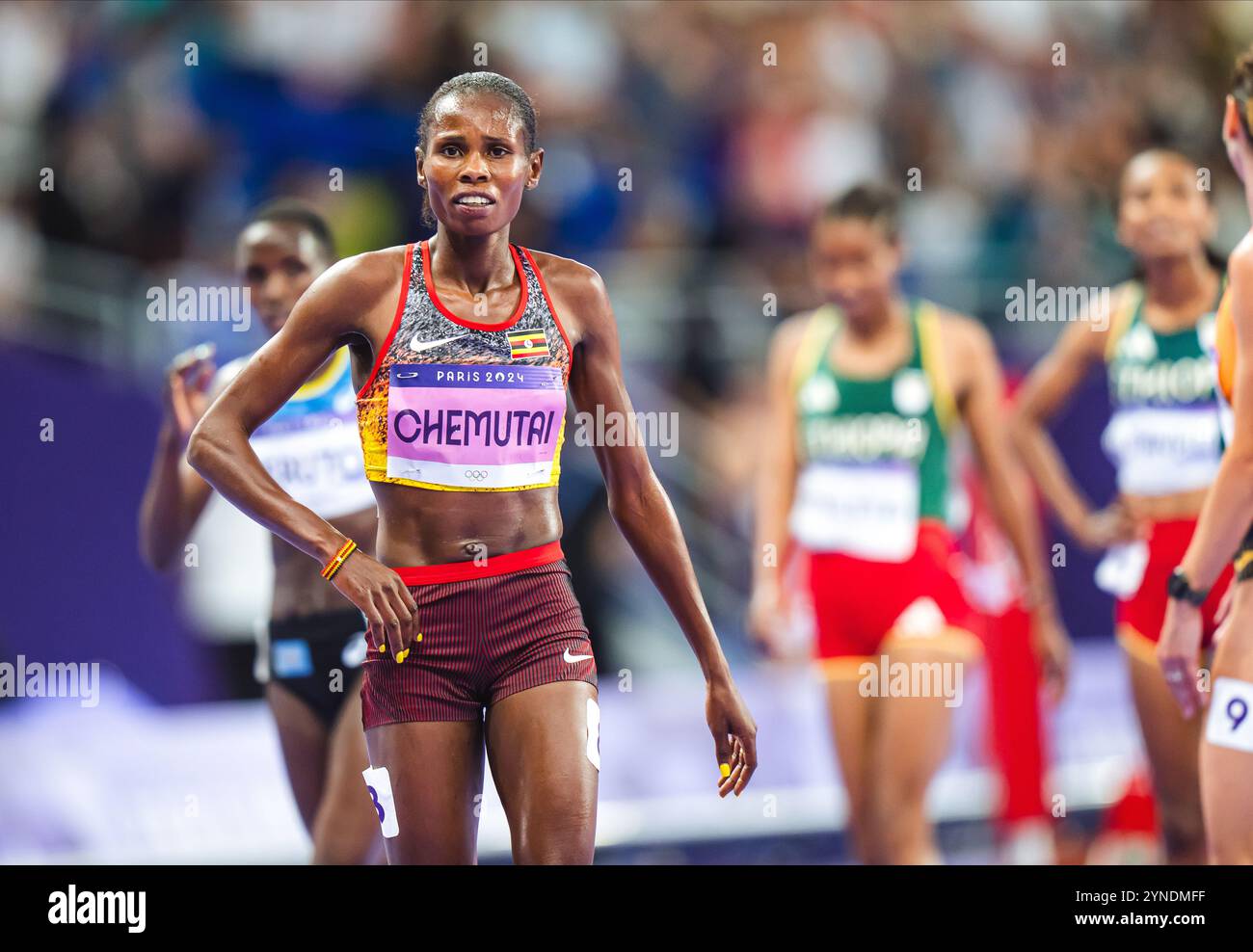 Peruth Chemutai participating in the 3000 metres steeplechase at the ...
