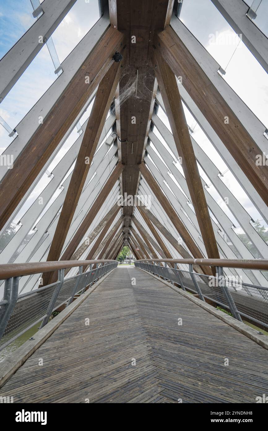 Modern wooden bridge with glass and symmetrical architecture Stock ...