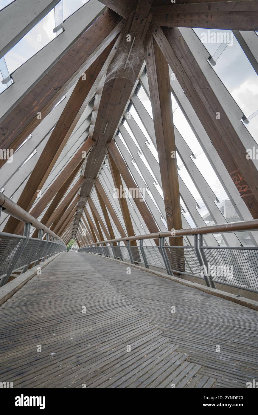 Interior view of a modern wooden bridge with glass roof Stock Photo - Alamy
