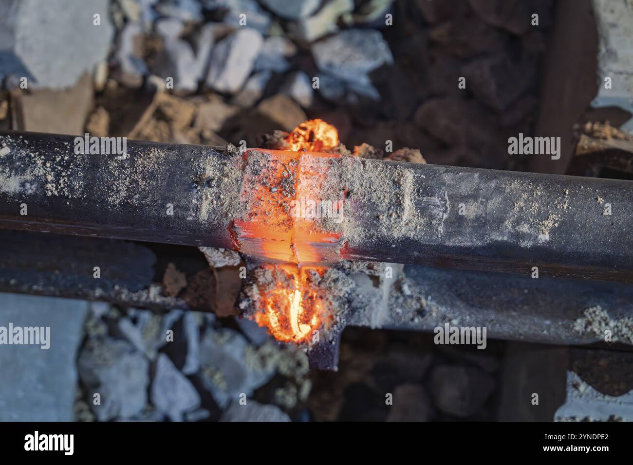 Weld seam on a rail from above with red-hot metal, rail welding, track ...