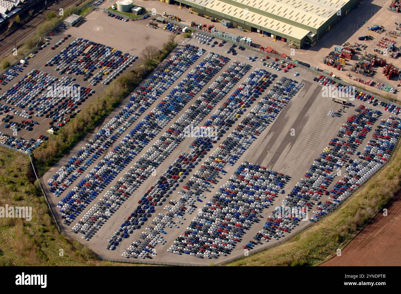 Aerial view of new cars stockpiled at Longbridge car factory in ...