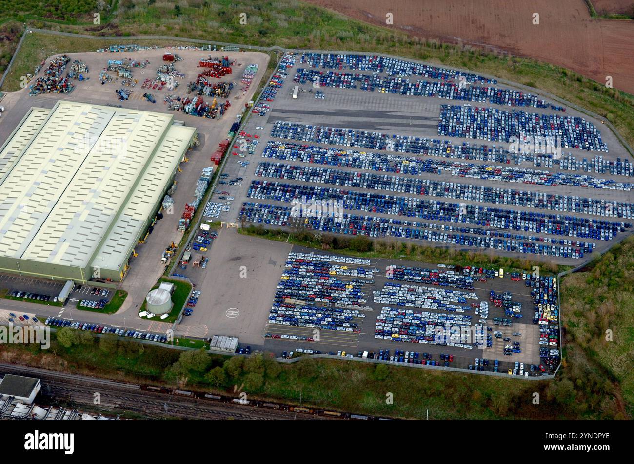 Aerial view of new cars stockpiled at Longbridge car factory in ...