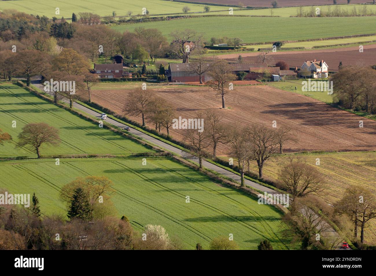 Aerial view of tree line English country lane near Halfpenny Green ...