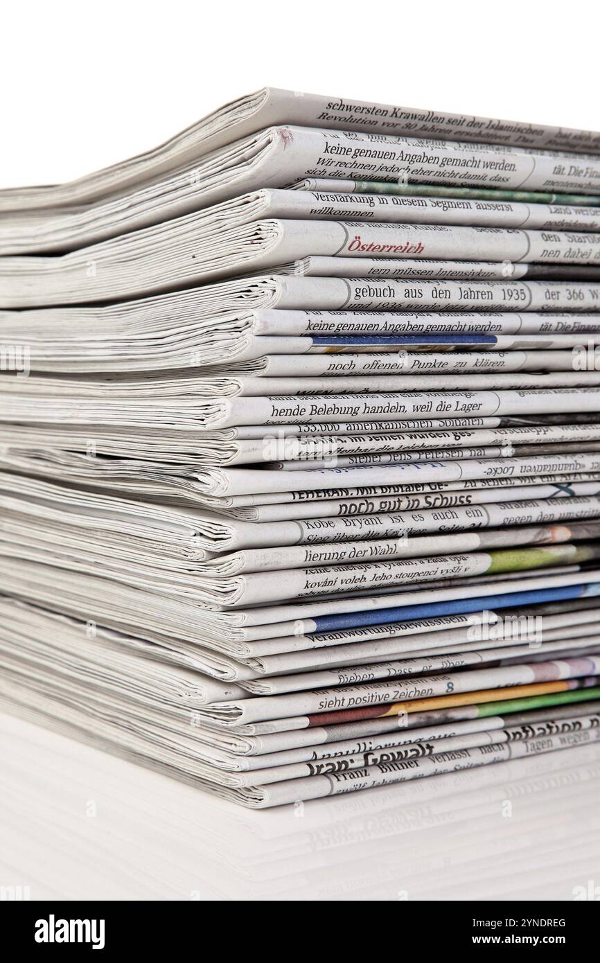 A pile of old newspapers is being disposed of, newspaper, magazines ...