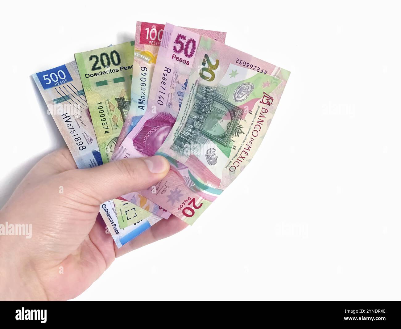 Cancun, Quintana Roo, Mexico. Dec 30, 2021. A person holding Mexican ...