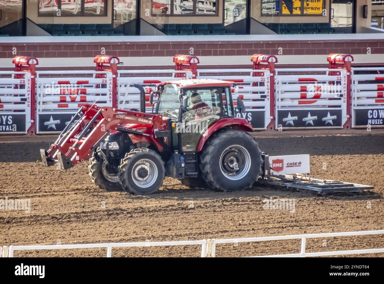 Calgary, Alberta, Canada. Jul 12, 2024. A tractor prepares the arena ...