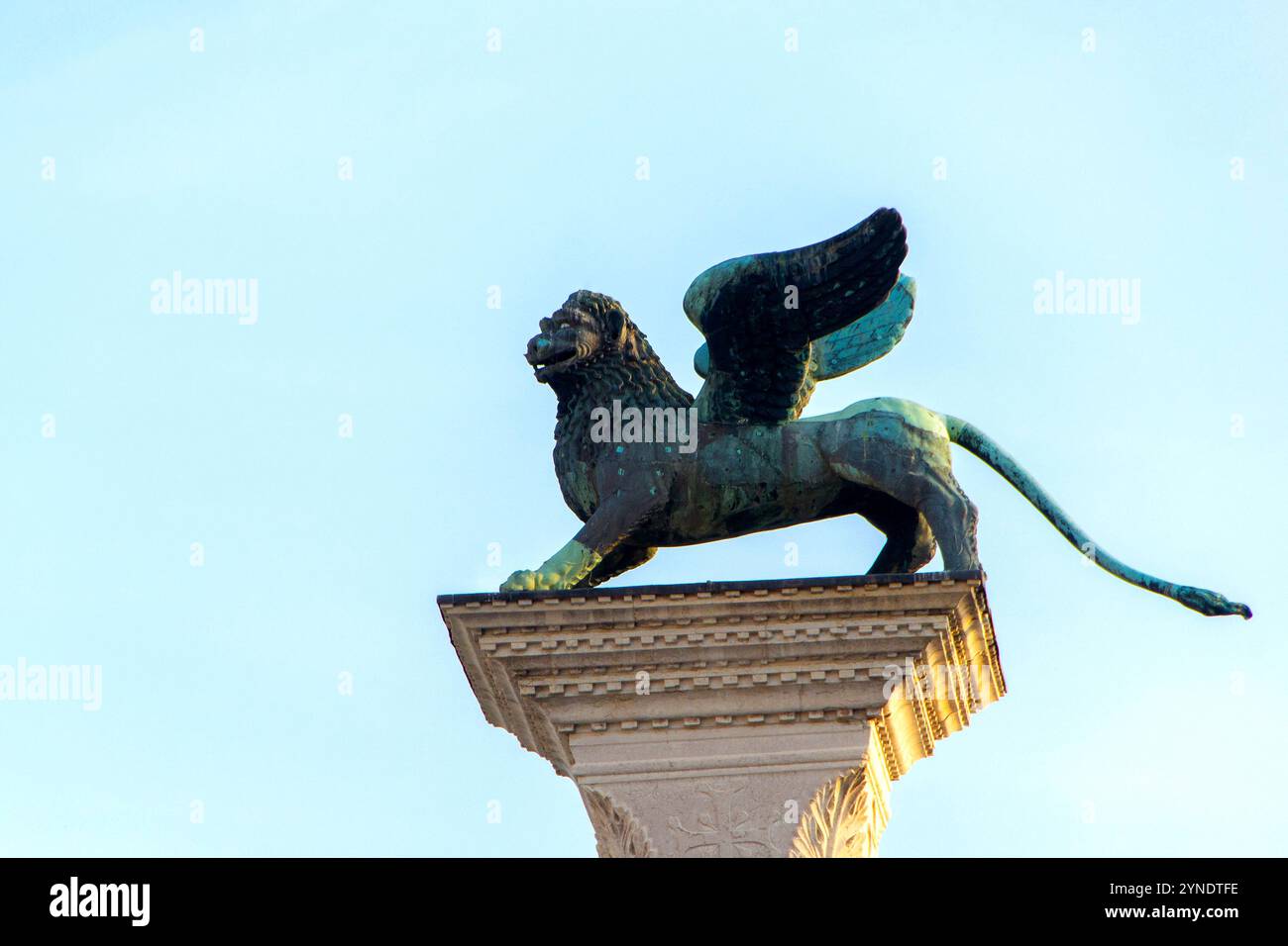 Close-up of the iconic Winged Lion of St. Mark statue perched atop a ...
