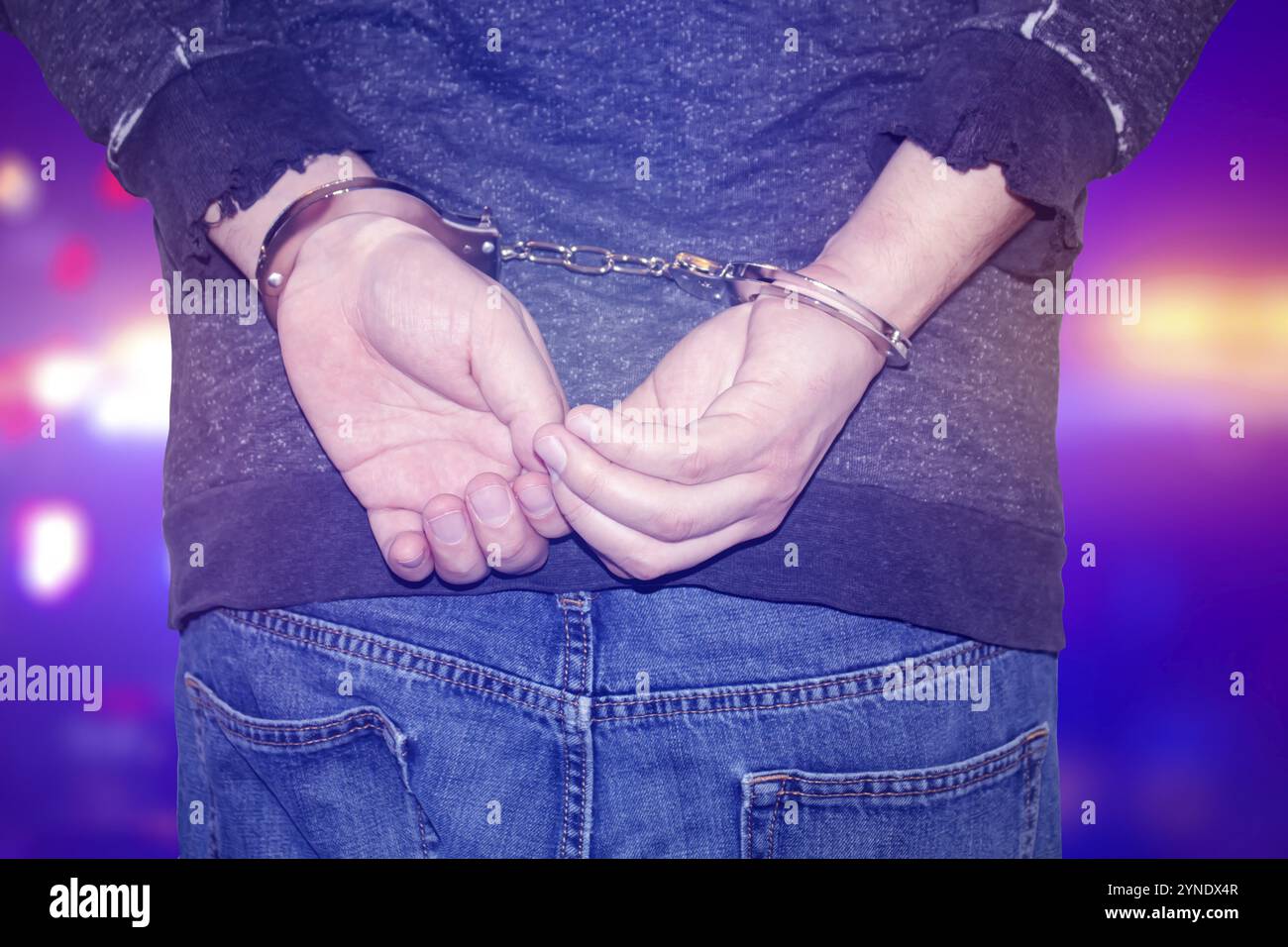 A person on handcuffs, male hands criminal with handcuffs Stock Photo ...