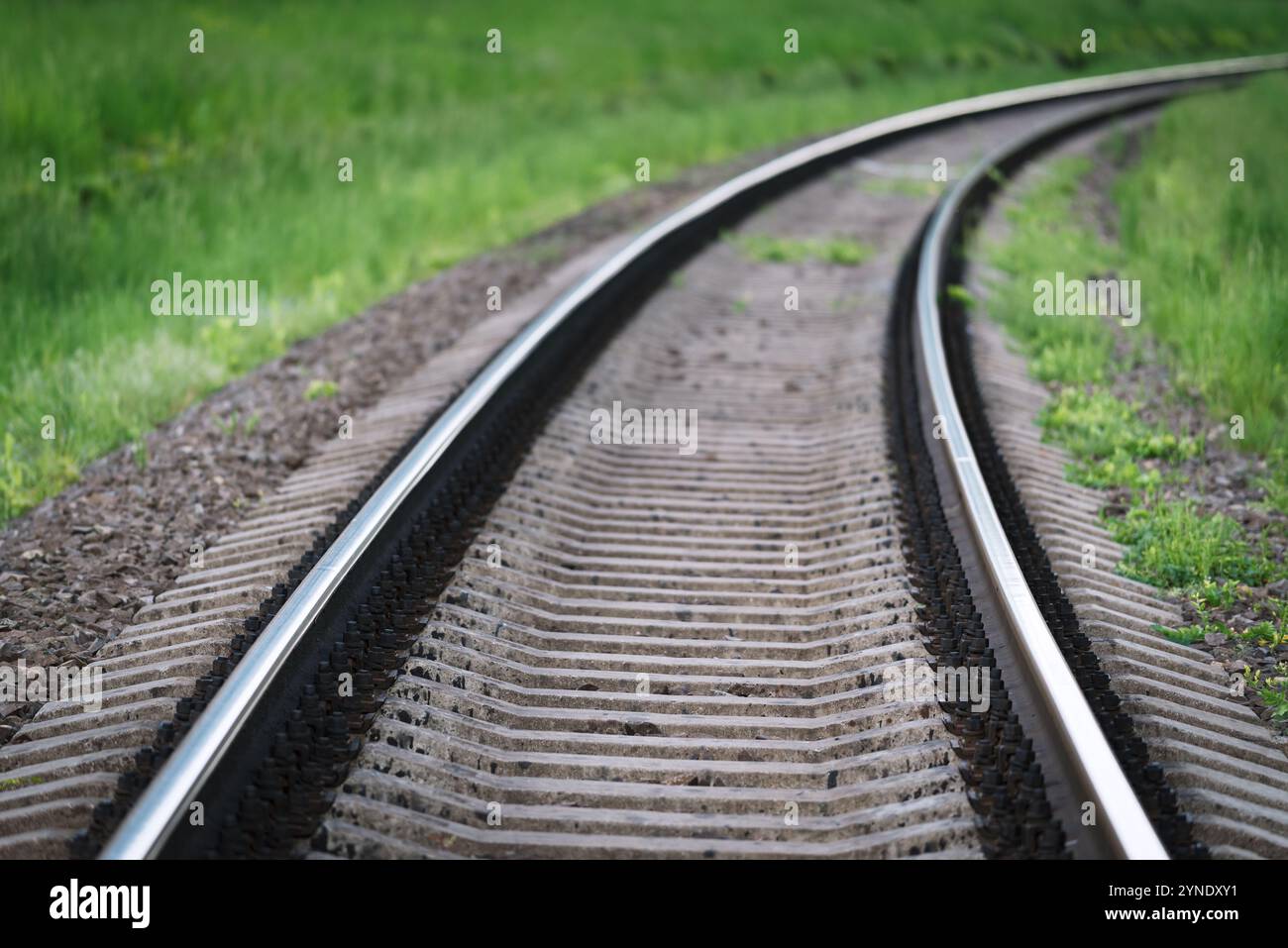 View of the railway tracks. Beautiful turn and perspective. Industrial ...