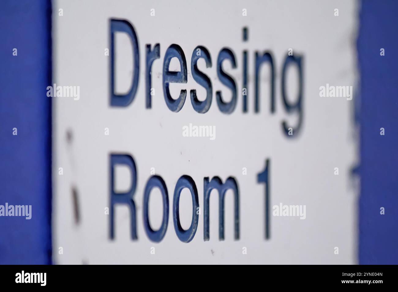A dressing room sign on a wall at a sports facility Stock Photo - Alamy