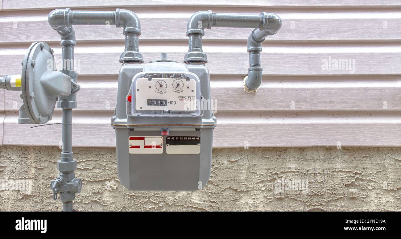 Residential urban natural gas meter measuring gas consumption, outside ...