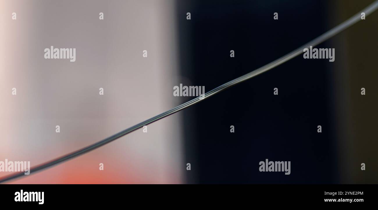 Close up of an electrical wire from the busy streets of Colombo. With a ...