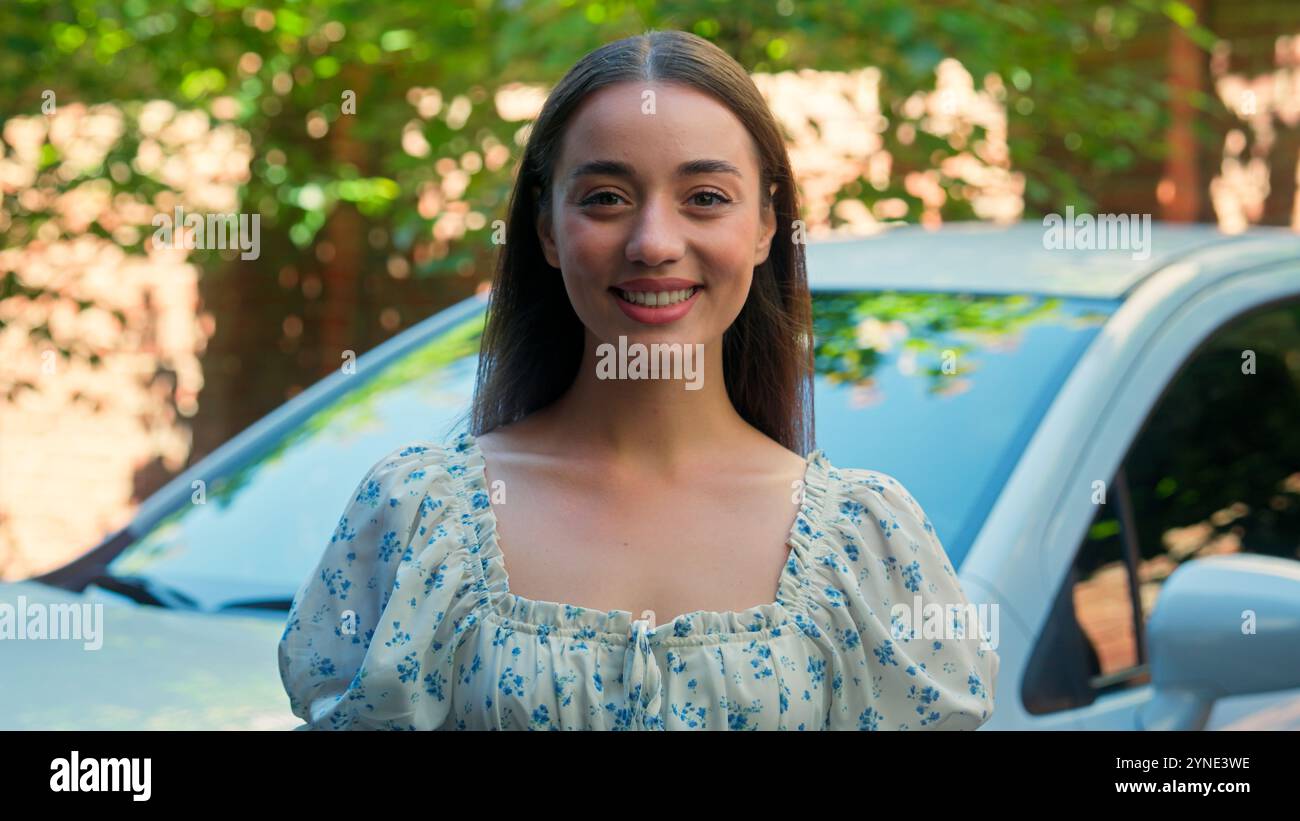 Smiling driver portrait happy joyful Caucasian woman female girl owner ...