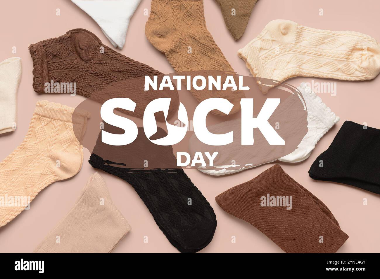 Many socks on beige background. Card for National Sock Day Stock Photo ...