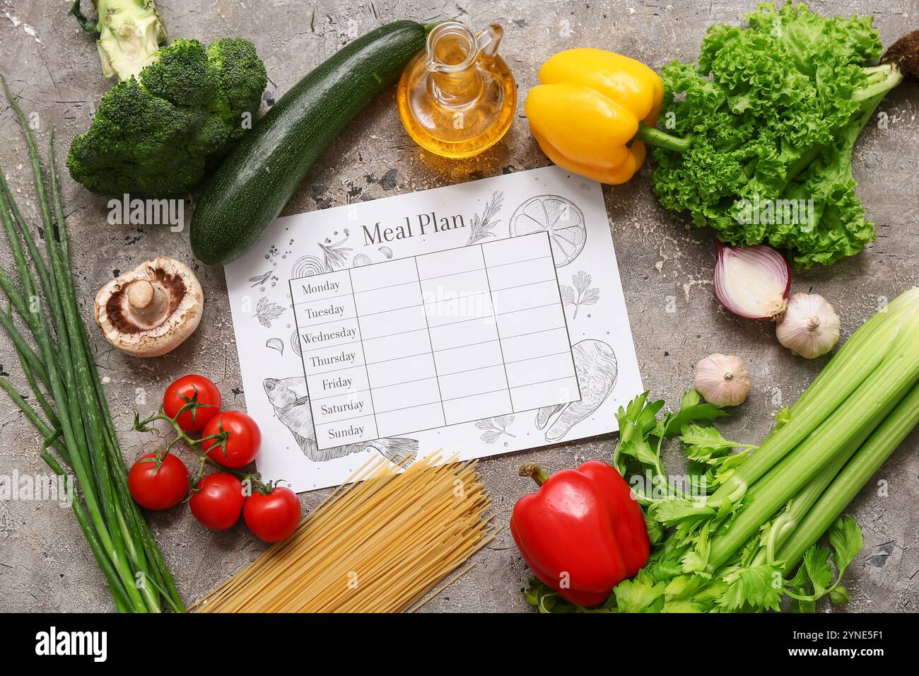 Healthy products and weekly meal plan on grey grunge background. Diet ...