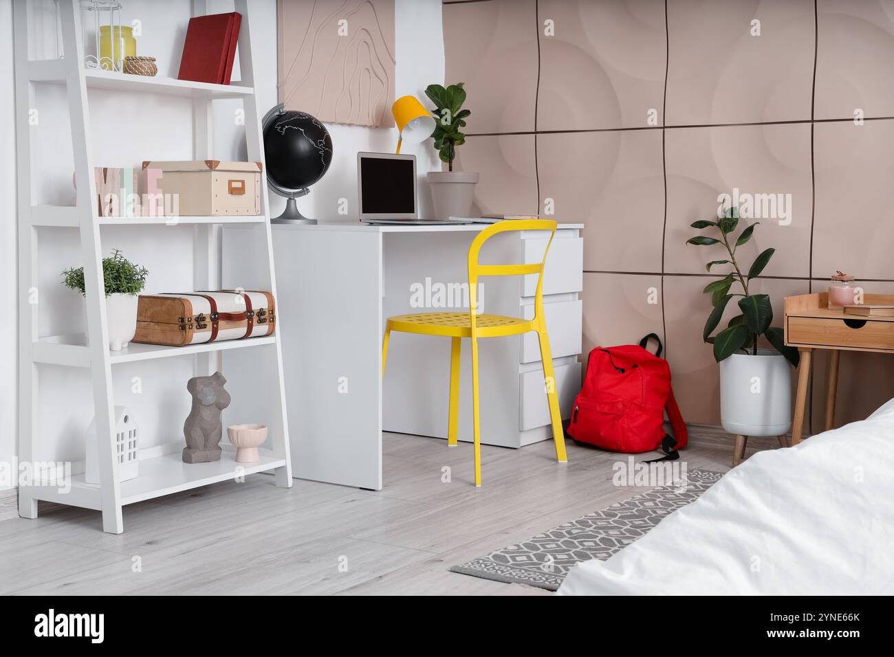 Interior of teenager's bedroom with study table and shelf unit Stock ...