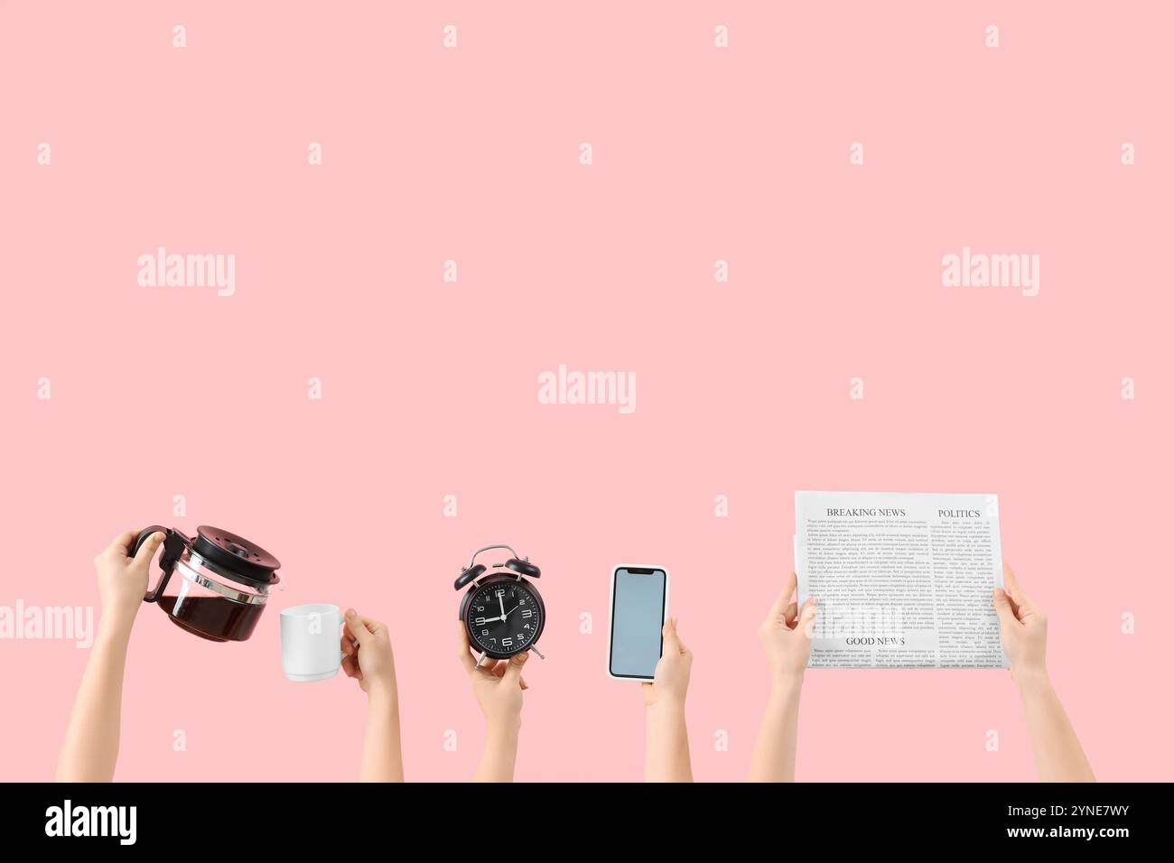 Female hands with coffee, alarm clock, mobile phone and newspaper on ...