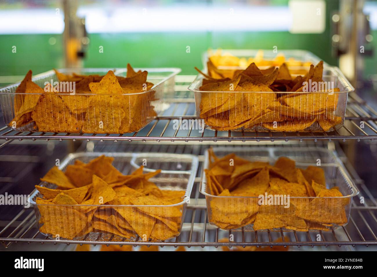 chips with different flavors in disposable plastic containers Stock ...