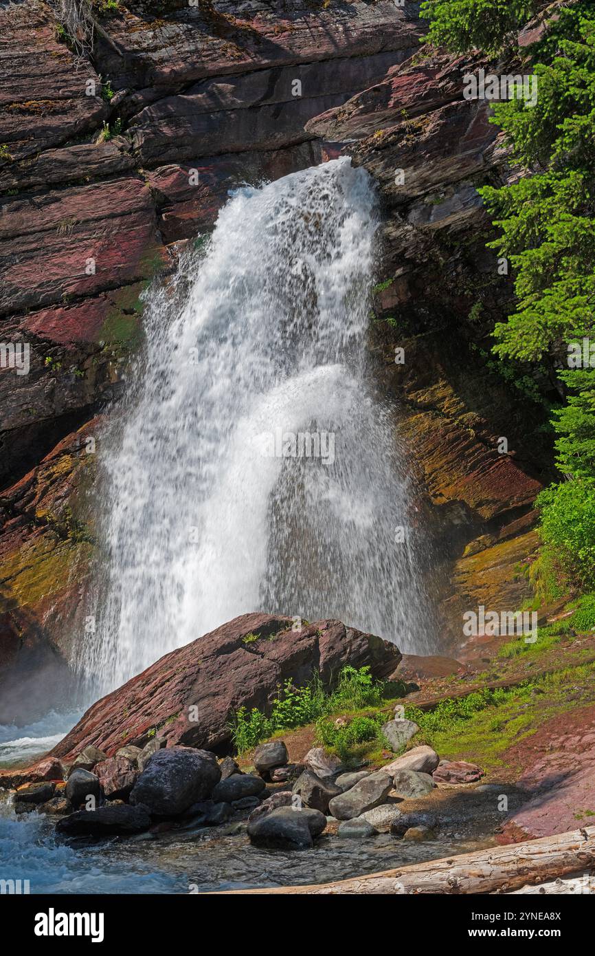Dramatic Baring Falls Coming Out of a Cliff in Glacier National Park in ...