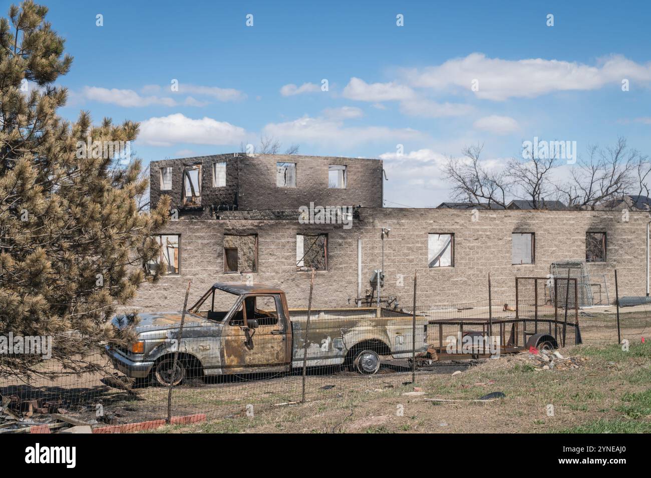 Aftermath of wildfire damage in residential neighborhood with complete ...