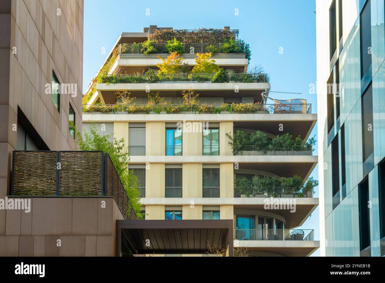 Contemporary building greenery covered terraces hi-res stock ...
