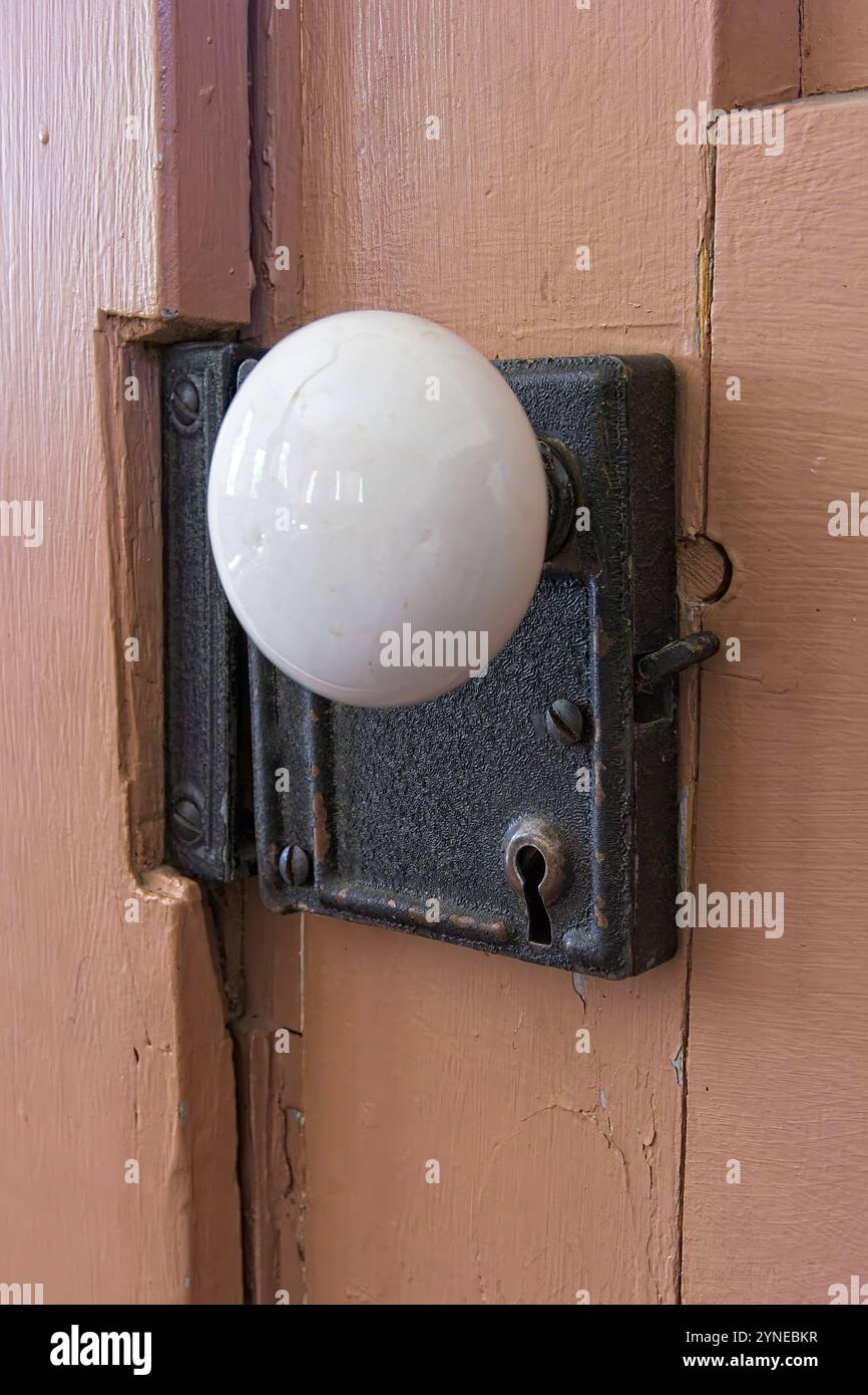 Cast iron antique rim lock with white door knob Stock Photo - Alamy