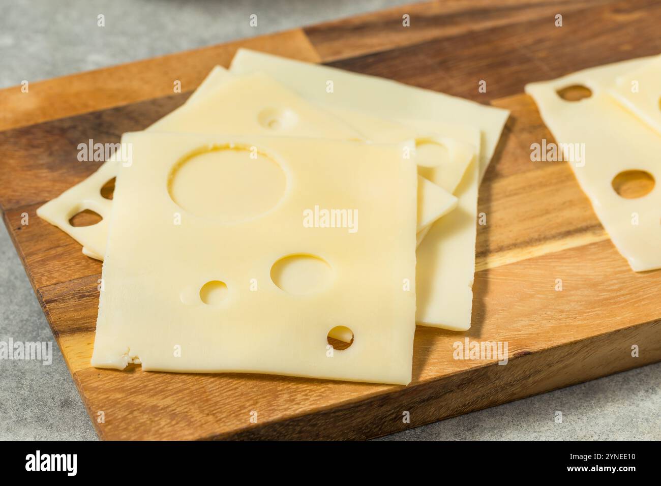 Organic Whole Milk Swiss Cheese Slices Ready to Eat Stock Photo - Alamy