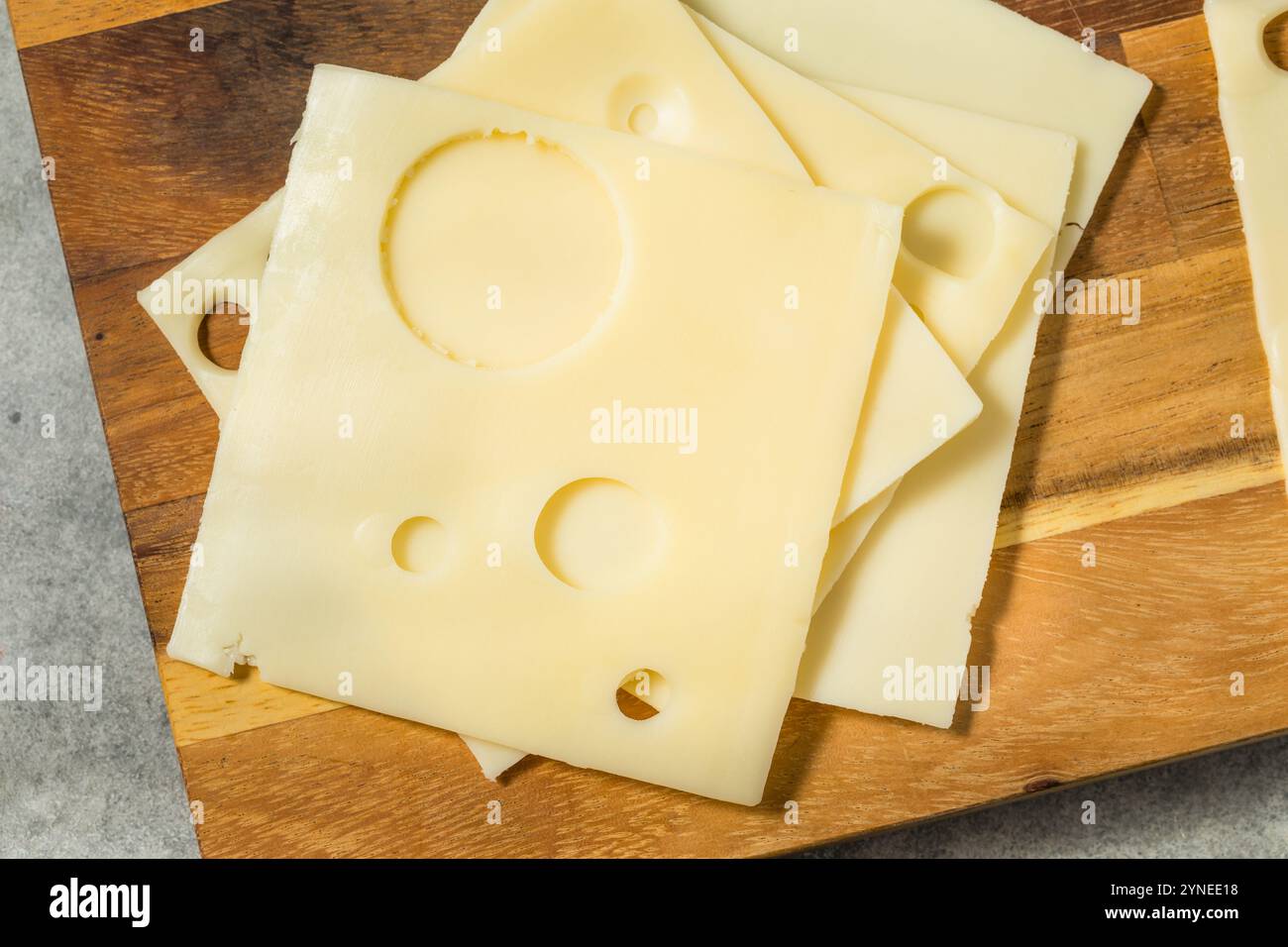 Organic Whole Milk Swiss Cheese Slices Ready to Eat Stock Photo - Alamy