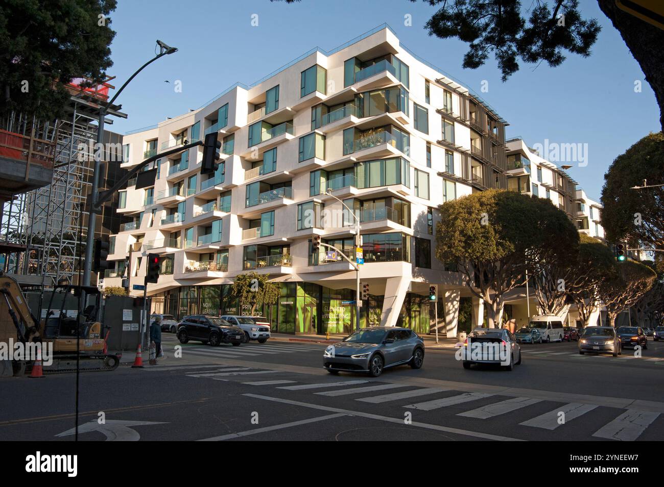 New housing development in the form of apartment units and street level ...