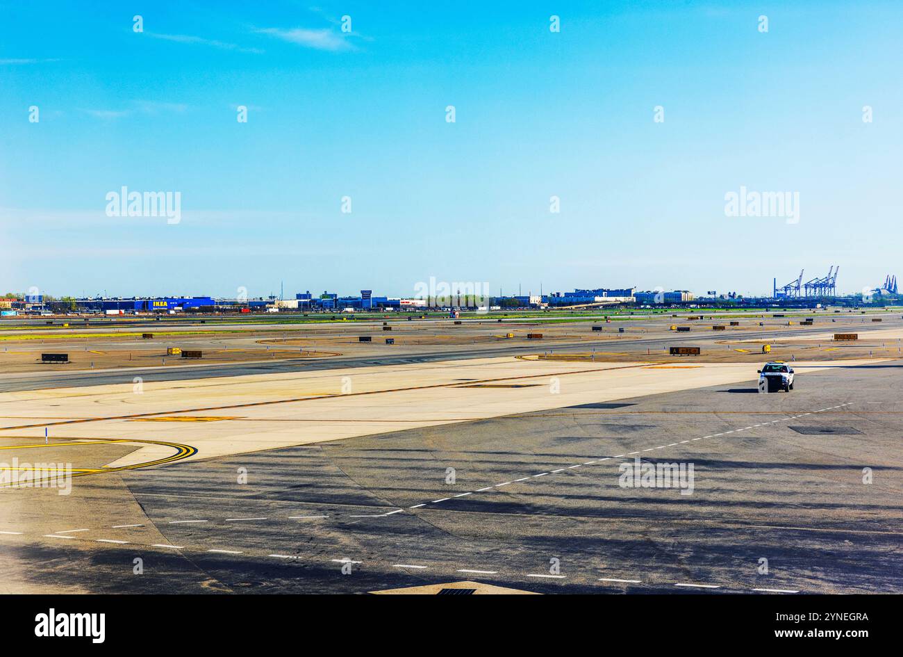 Runway at Newark Liberty International Airport with view of the IKEA ...