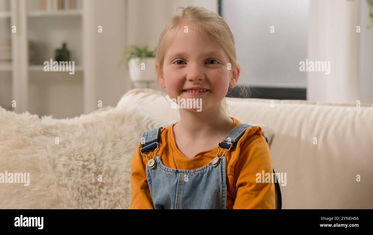 Positive happy Caucasian kid schoolchild gen z child pose looking at ...