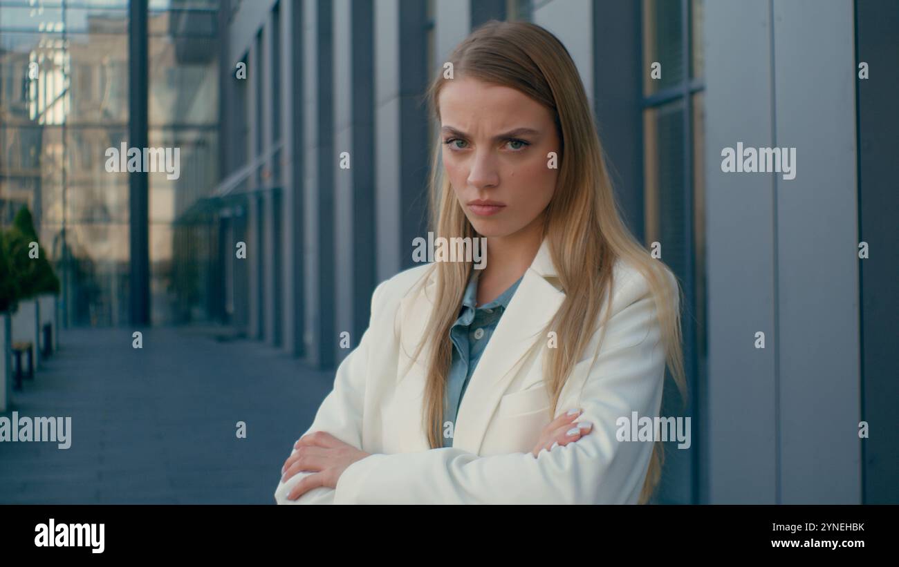 Angry annoyed dissatisfied Caucasian woman businesswoman business lady ...