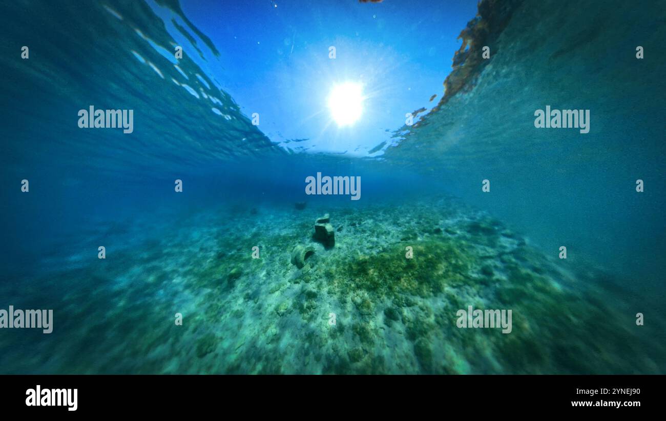 Underwater photo of submerged stone blocks, lying on the sea bottom at ...