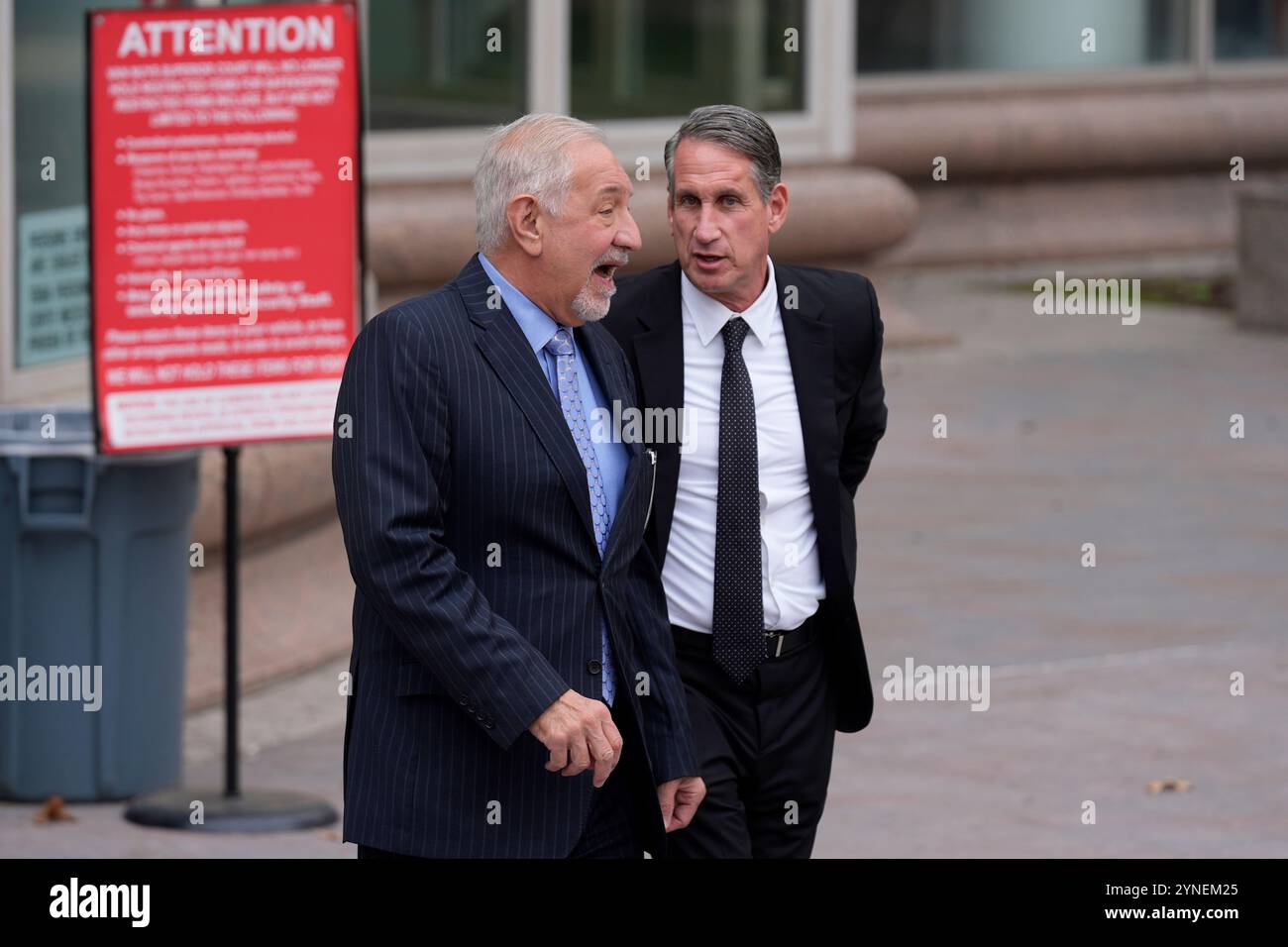 Attorneys Mark Geragos, left, and Bryan Freedman, leave the Van Nuys ...