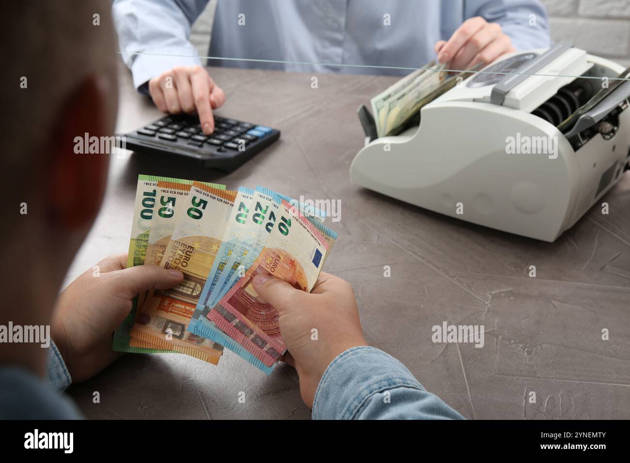 Many people work counting hi-res stock photography and images - Alamy