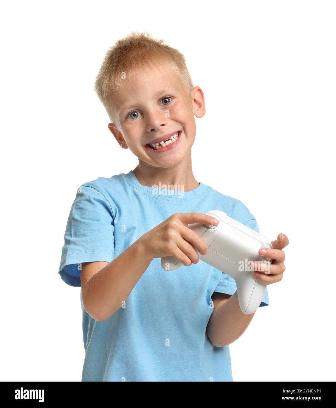 Happy little boy playing video game with controller on white background ...