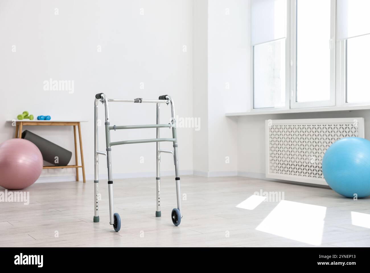Metal walking frame in room. Medical equipment Stock Photo - Alamy